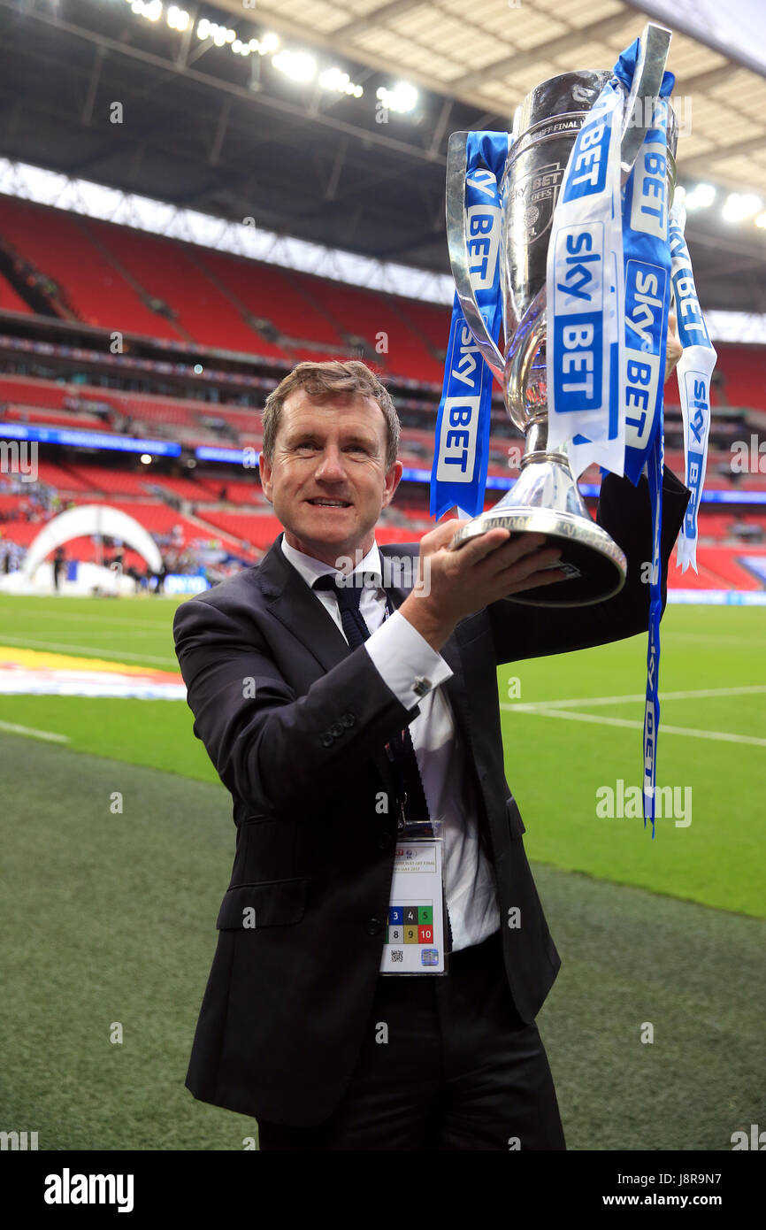 Huddersfield Town chairman Dean Hoyle with the trophy after winning the ...