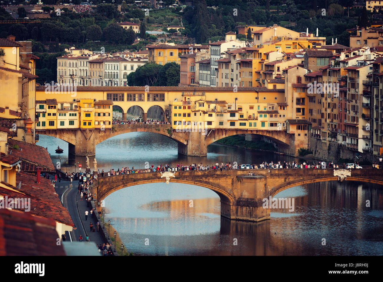 The Ponte Vecchio at sunset, Old Bridge, in Florence, Italy Stock Photo ...