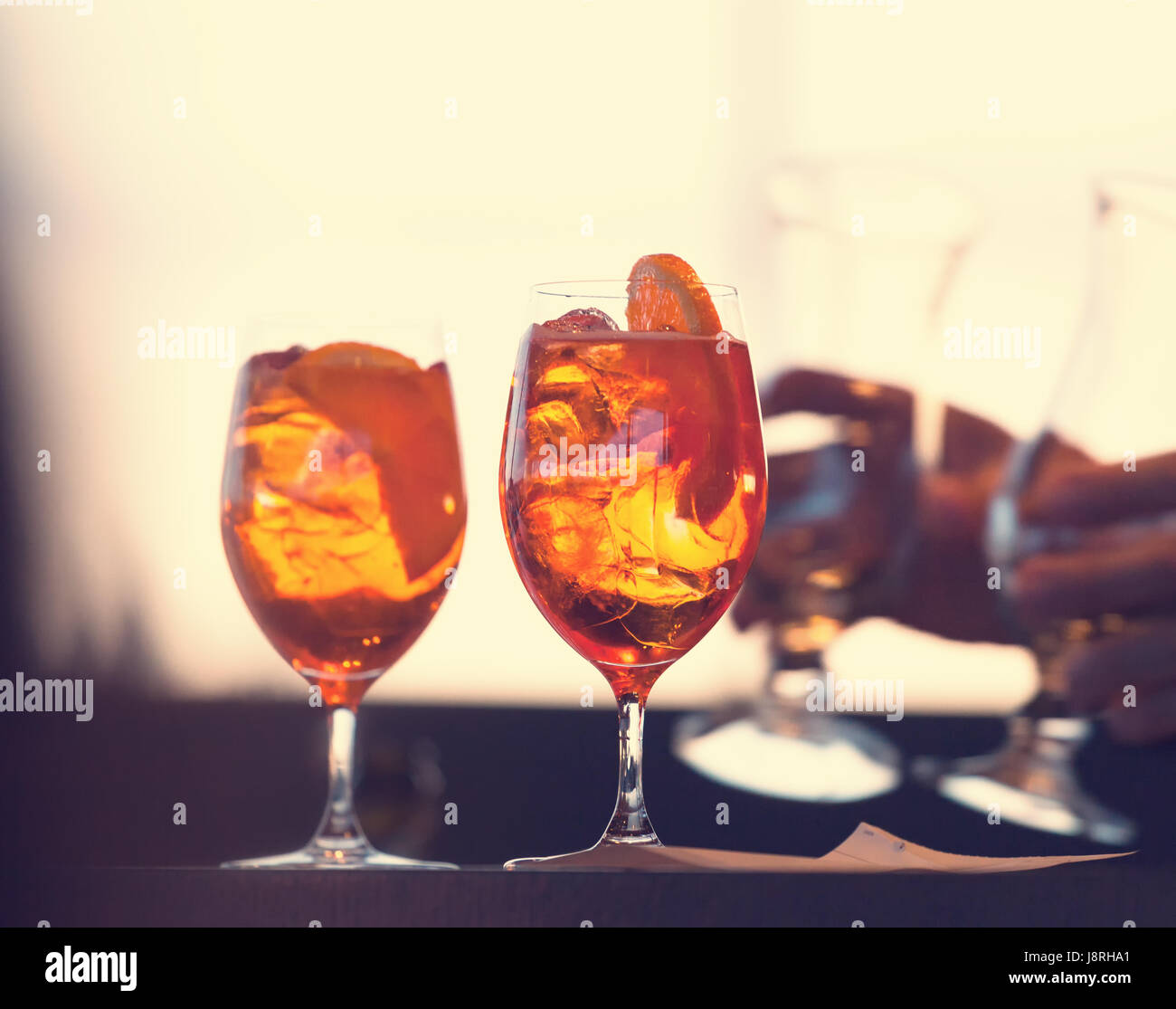 Two glasses of spritz cocktail at sunset Stock Photo - Alamy