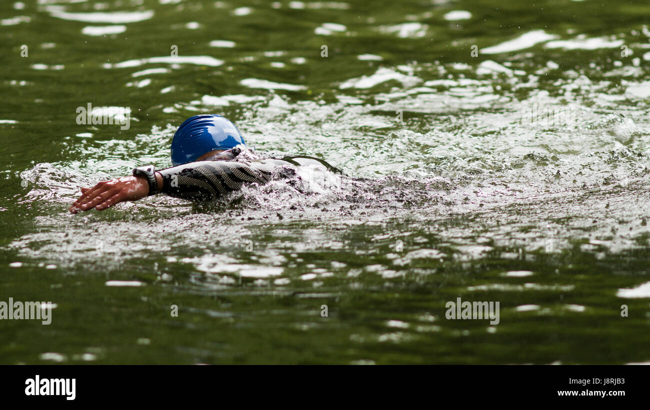Aquatic sport contest triathon float hi-res stock photography and ...