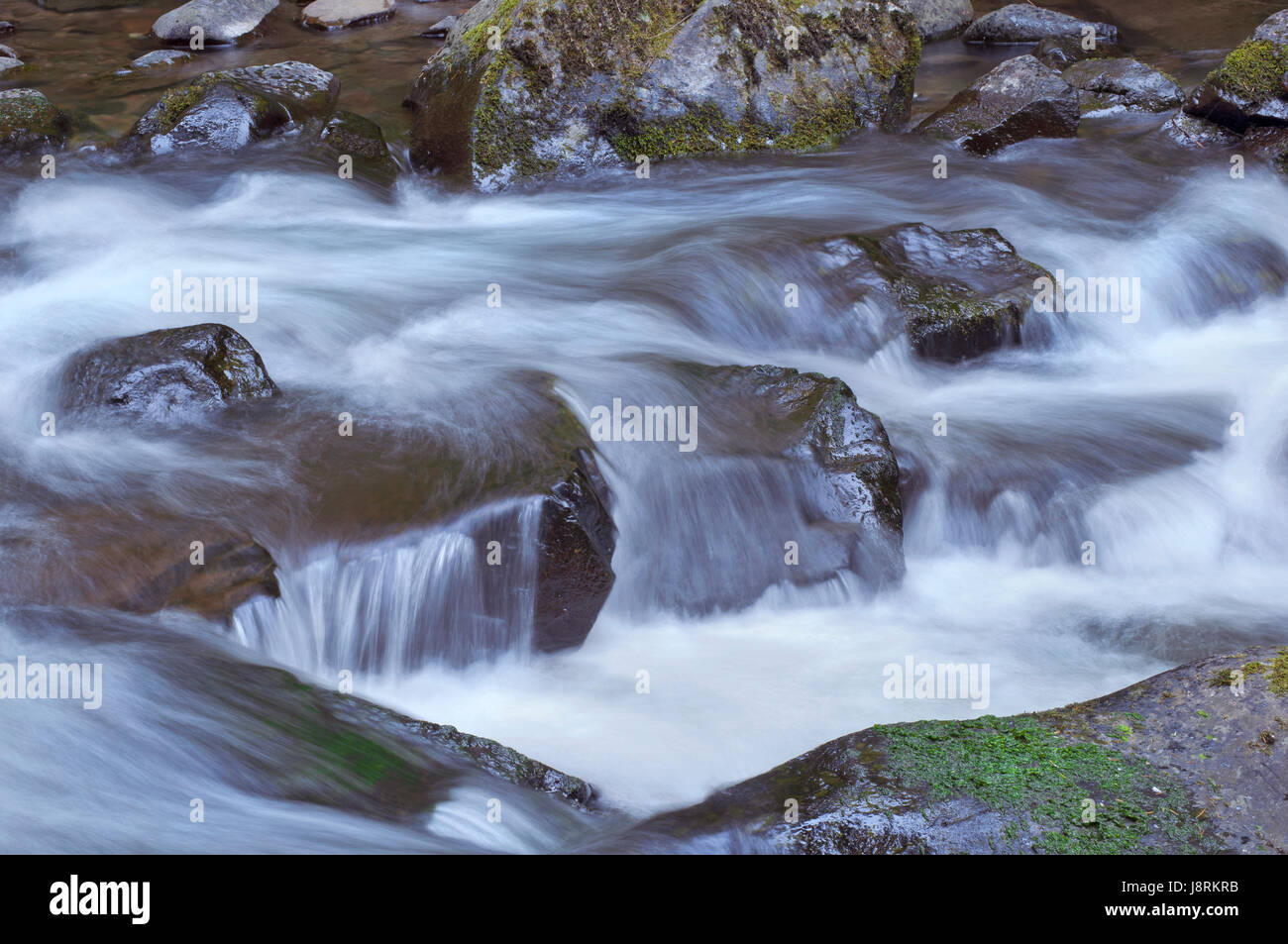 Rushing river water flowing over rocks in Lebanon, Oregon Stock Photo ...