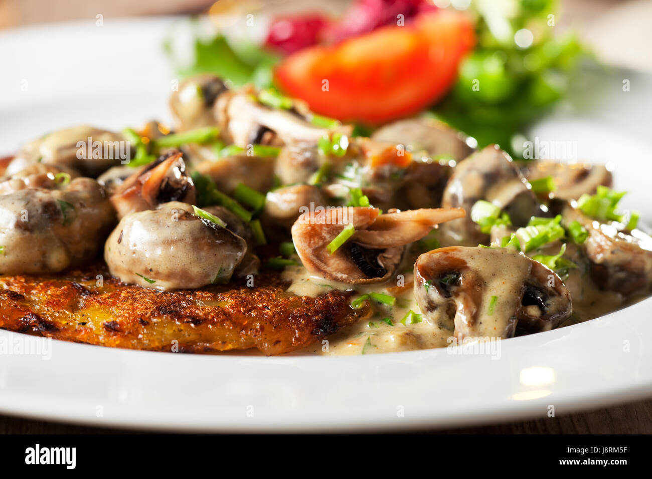 bavarian rosti with mushroom sauce Stock Photo - Alamy