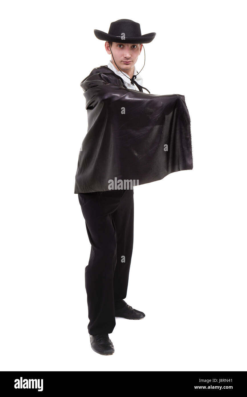 man wearing a zorro costume posing, isolated on white in full length ...