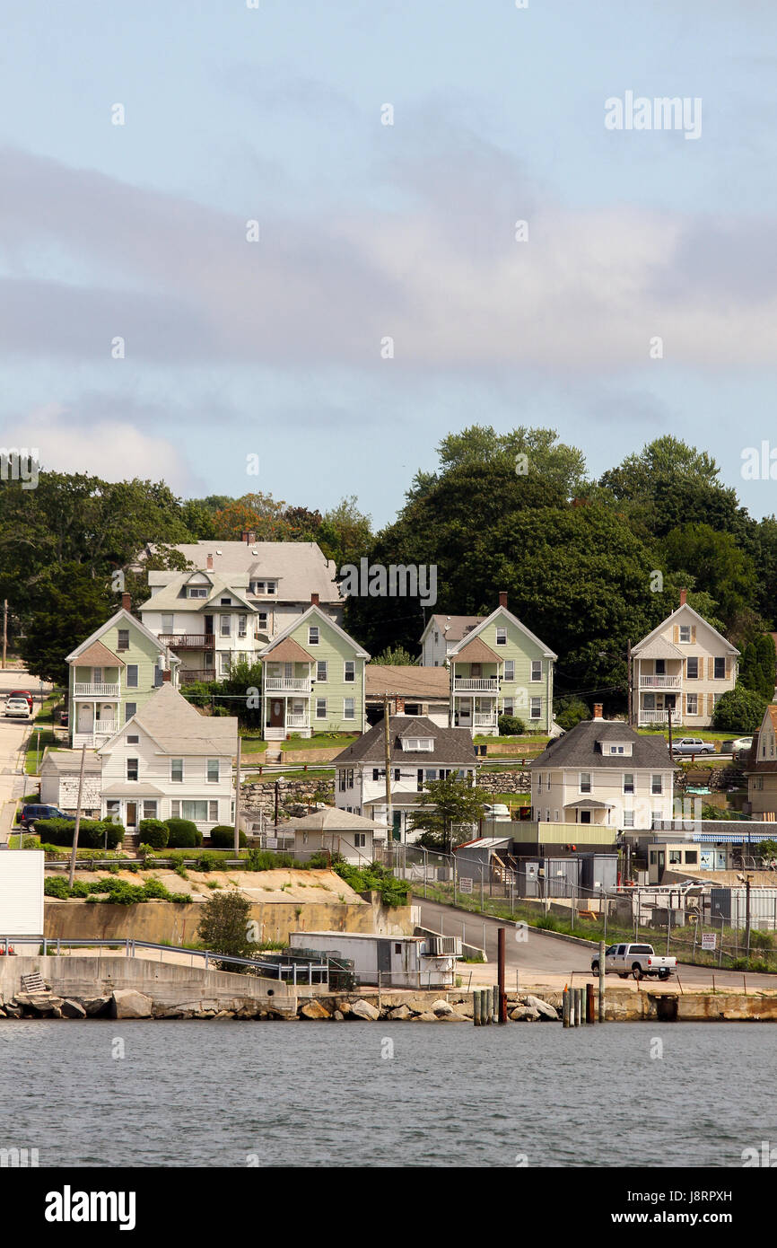 A view from the harbor of houses in Groton, Connecticut, United States ...