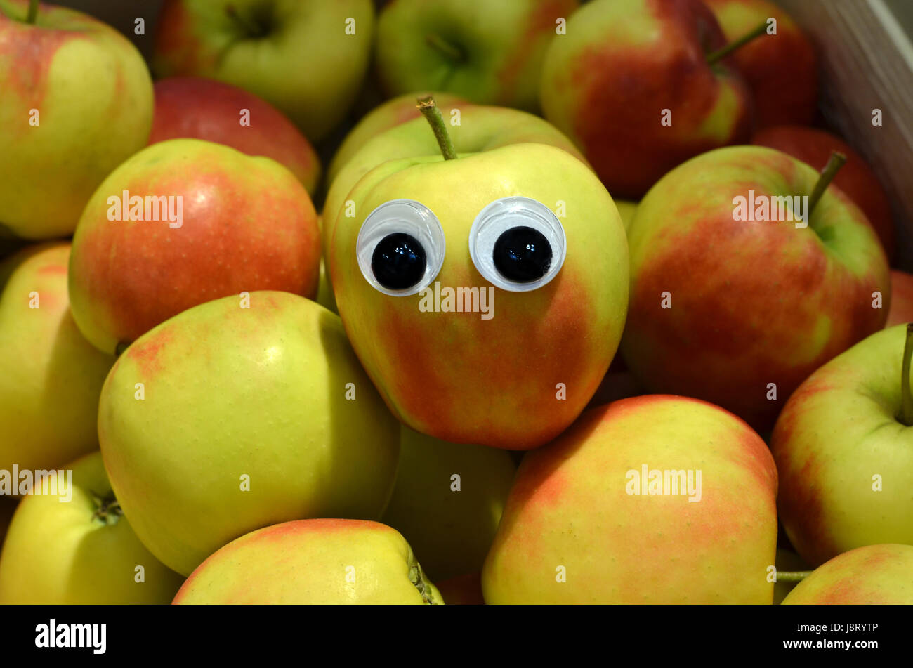apple with eyes Stock Photo - Alamy