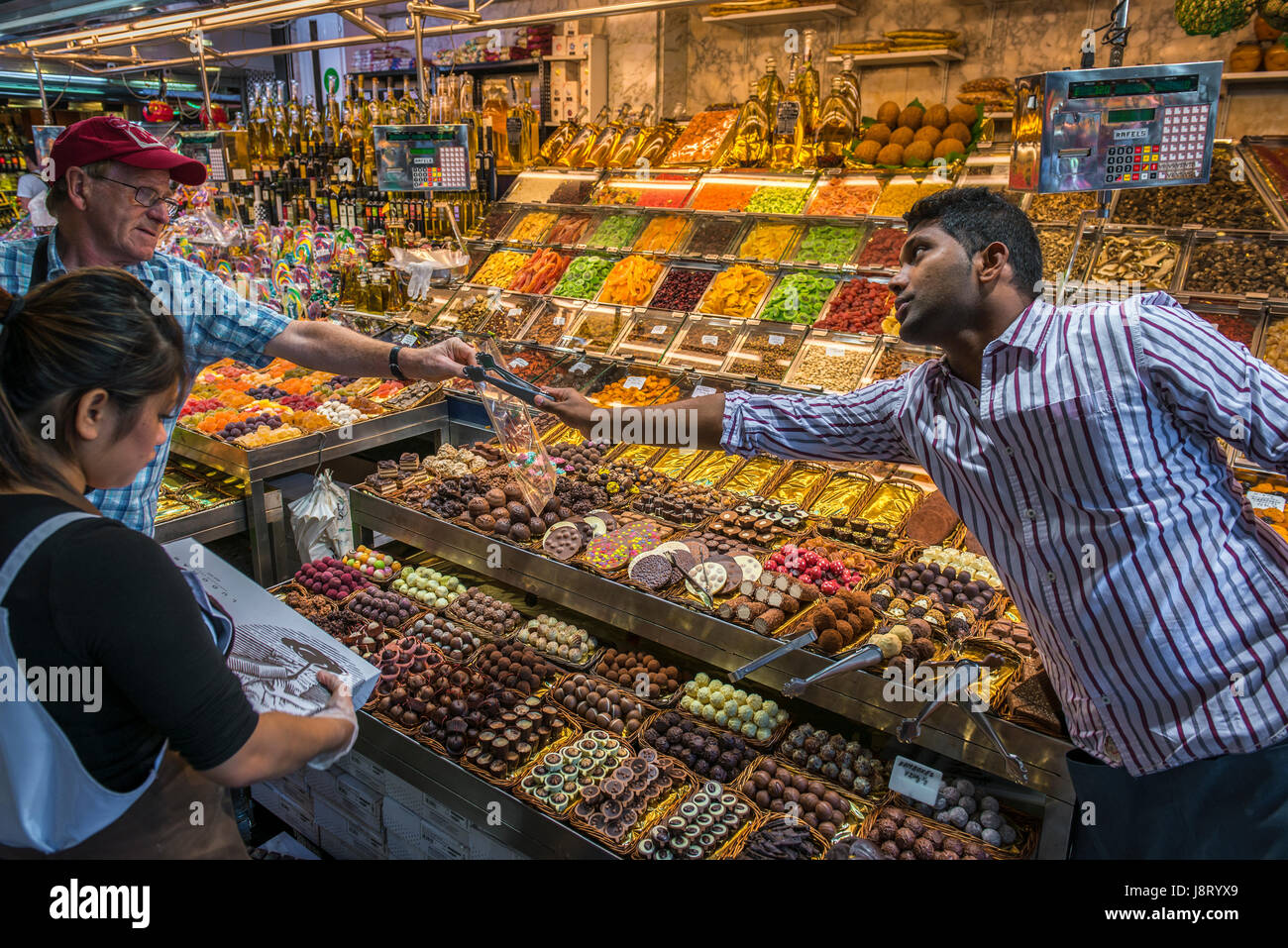 Barcelona, Spain - 18 September 2013 - Customers may sample the sweets ...