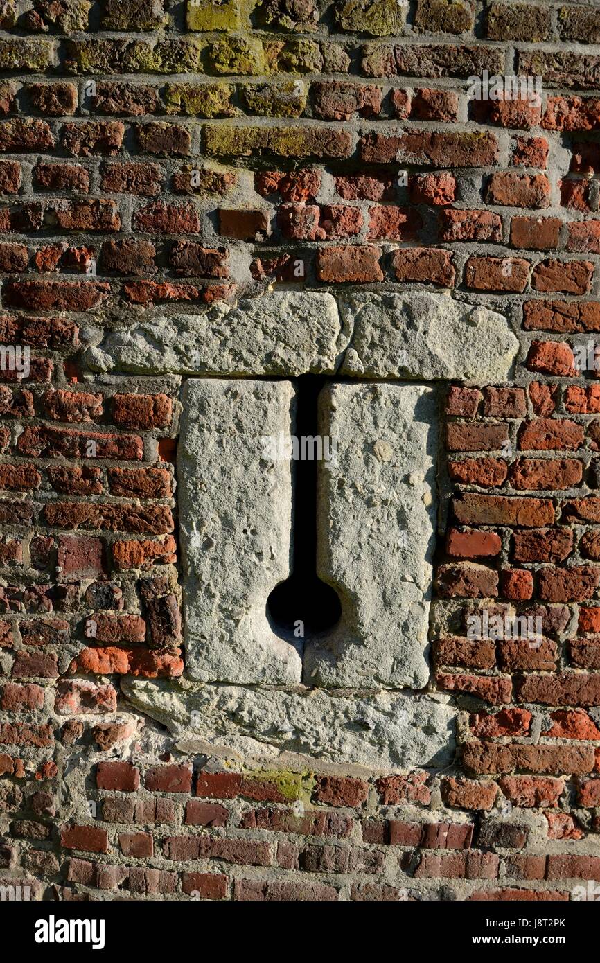 loophole in the historic building Stock Photo - Alamy
