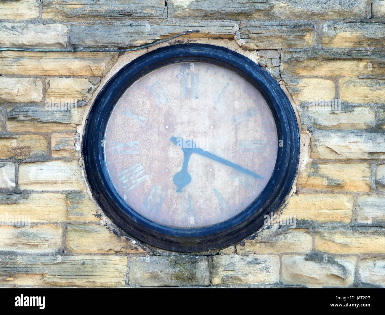 old rusty faded clock on a brick wall Stock Photo - Alamy