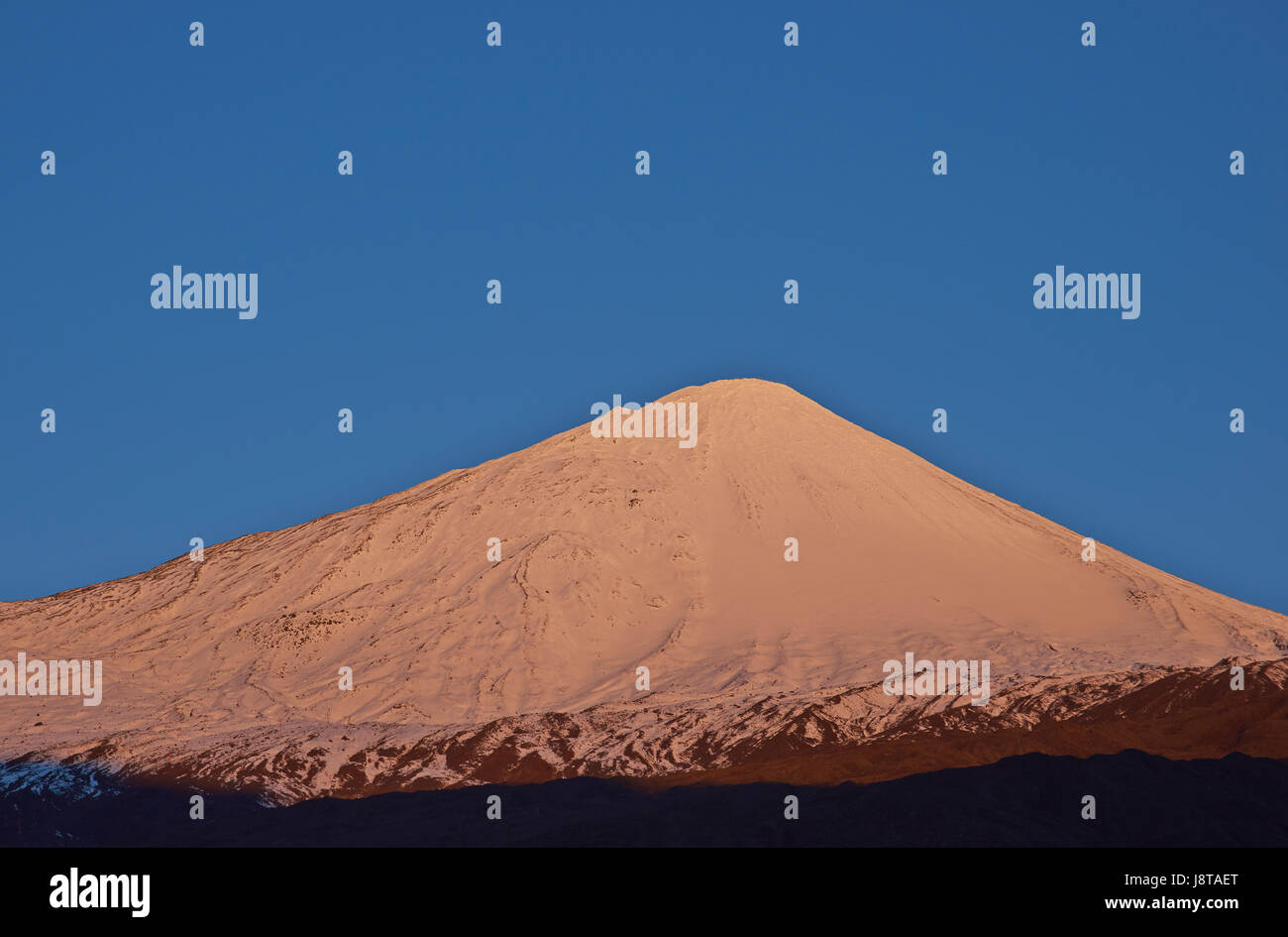 Snow capped peak of Antuco Volcano (2,979 metres) in Laguna de Laja ...