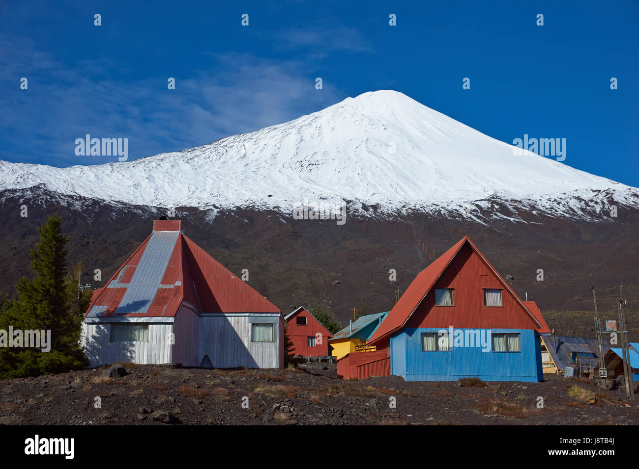 Snow capped peak of Antuco Volcano (2,979 metres) rising above the ...