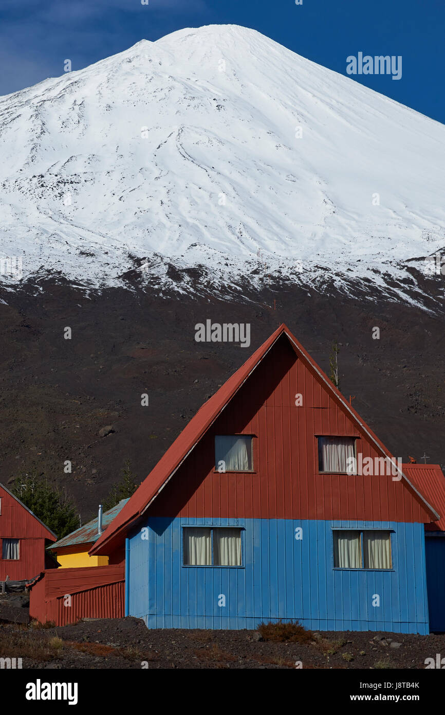 Snow capped peak of Antuco Volcano (2,979 metres) rising above the ...