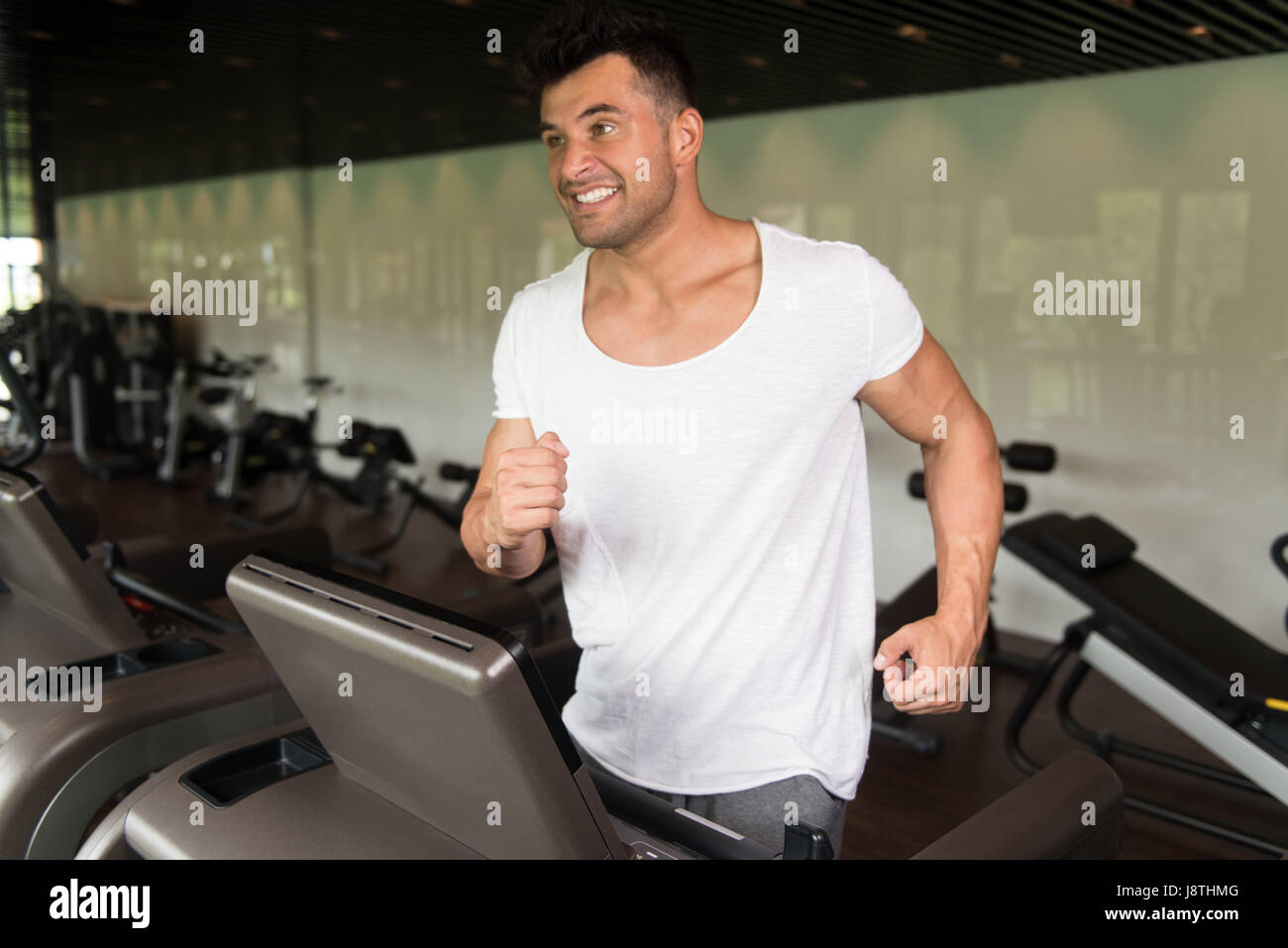 Man running fast fitness wellness hi-res stock photography and images ...