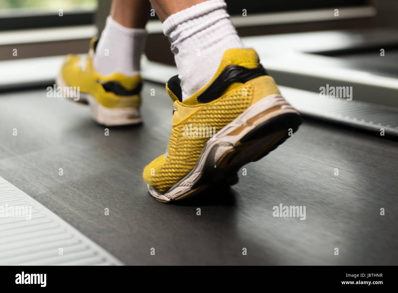Black runners legs hi-res stock photography and images - Alamy