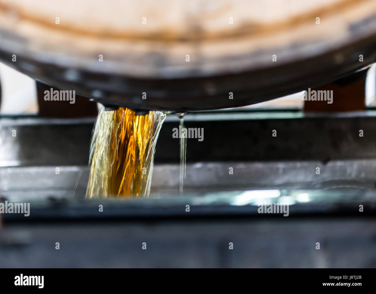 Bourbon Emptying from Freshly Opened Barrel along production line Stock ...