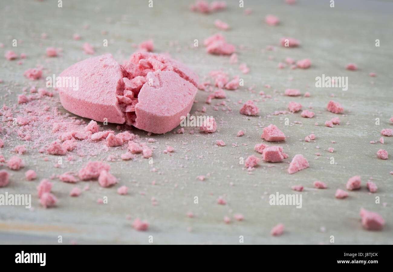 Broken Candy Heart with Crushed Candy Bits Strewn Around Wide Stock ...
