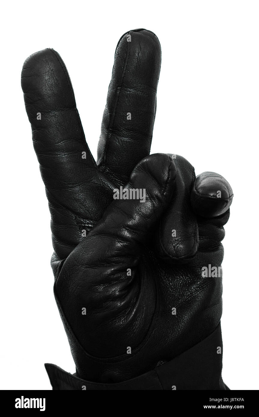 hand with glove showing signs winner Stock Photo - Alamy