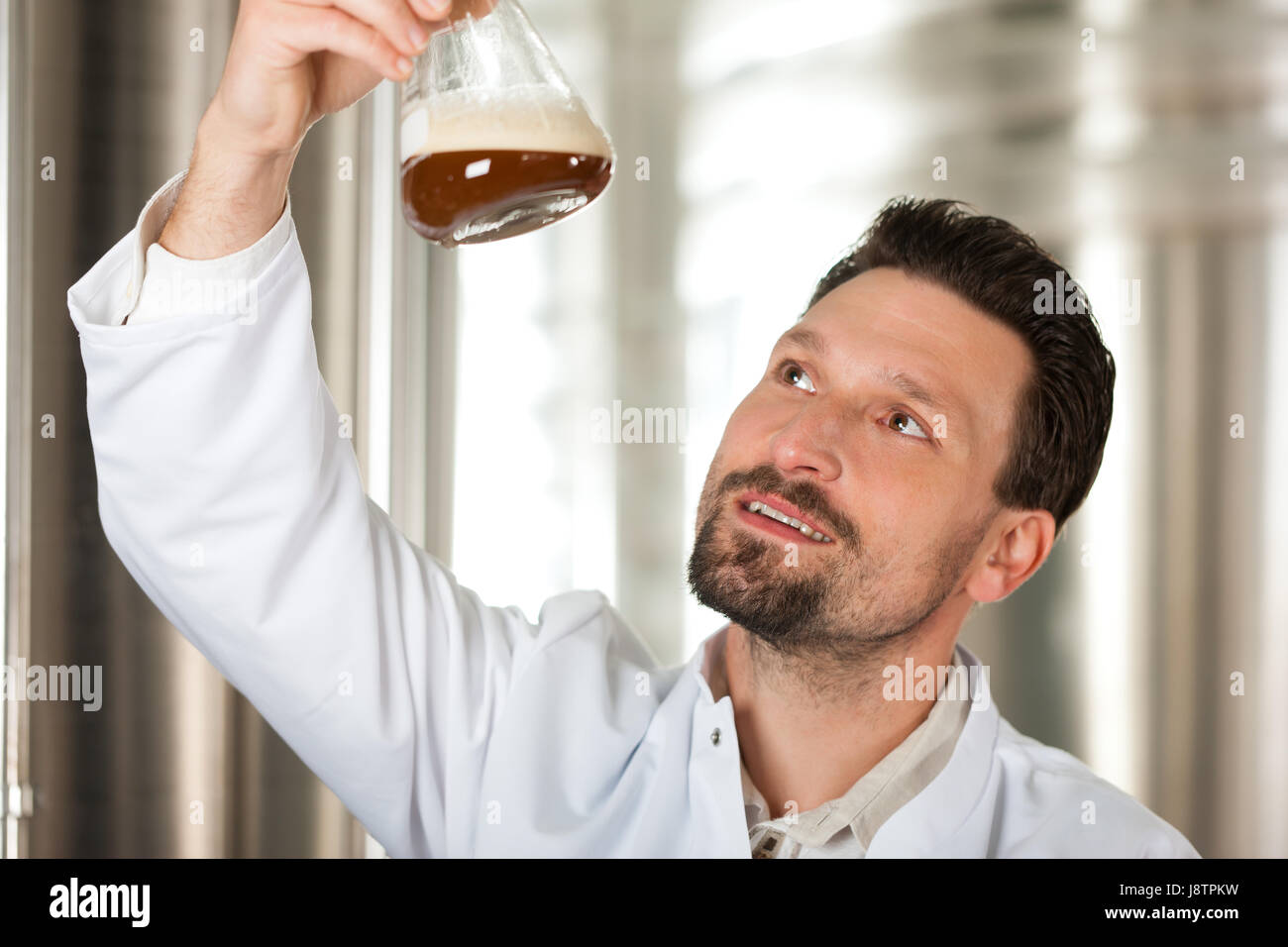 brewmaster for beer in his brewery Stock Photo - Alamy