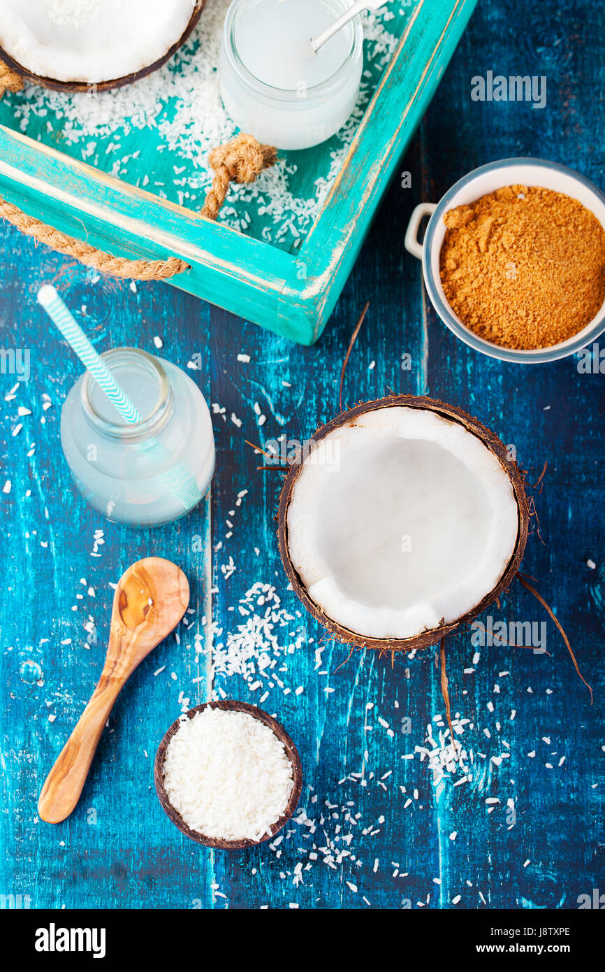Coconut with coconut oil, water and sugar Top view Stock Photo - Alamy
