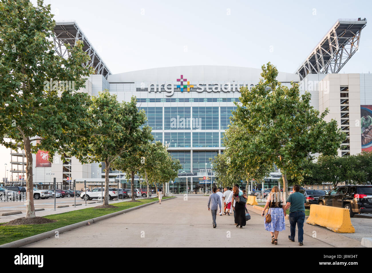 People walking towards the front entrance of the NRG Stadium, Houston ...