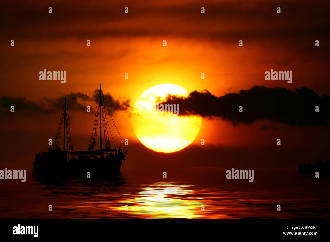 ship before sunset Stock Photo - Alamy
