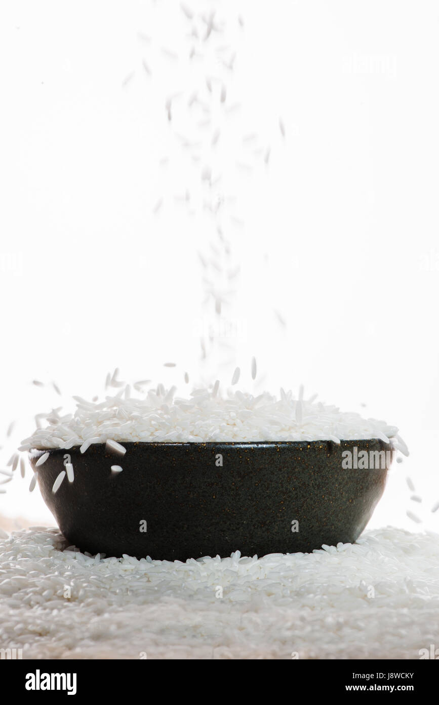 White Rice falling down. Jasmine Rice, Thai Rice, Raw Rice Stock Photo ...