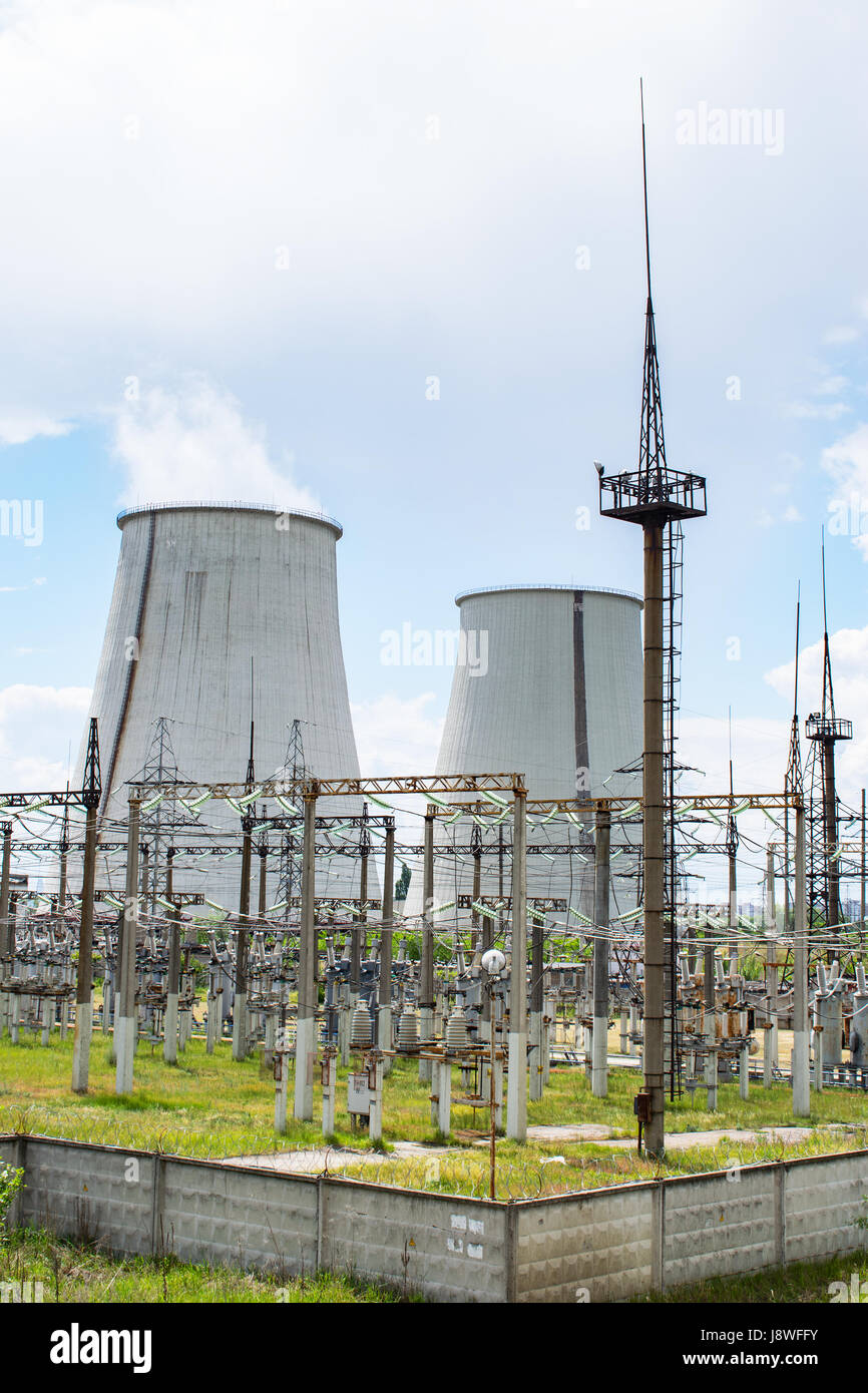 Power plant transformator station and cooling towers Stock Photo - Alamy