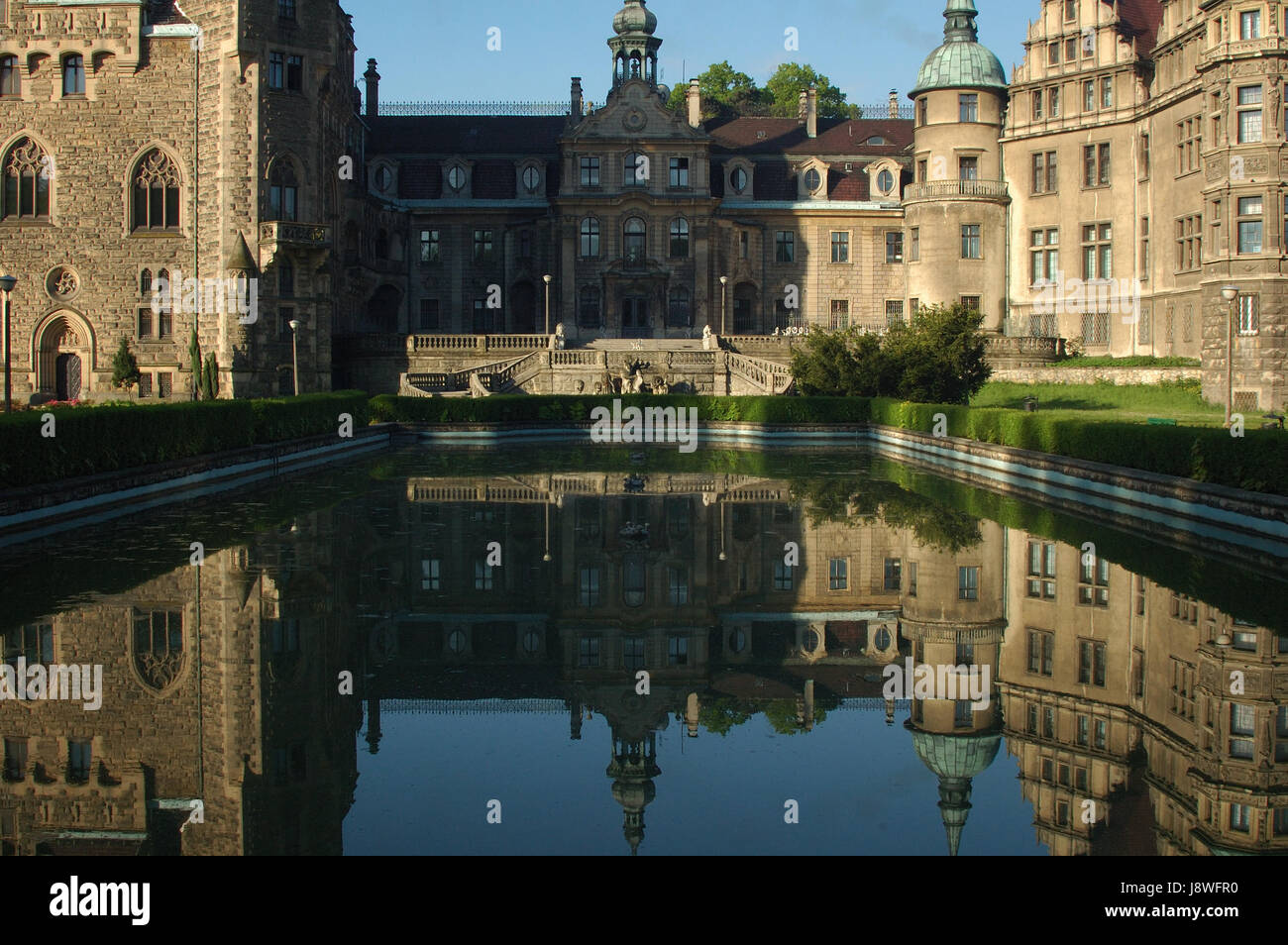 castle and its reflection in water Stock Photo - Alamy