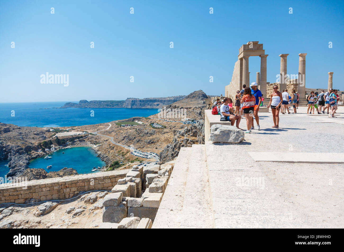 LINDOS, RHODES ISLAND, GREECE - September 3, 2015: People visiting the ...