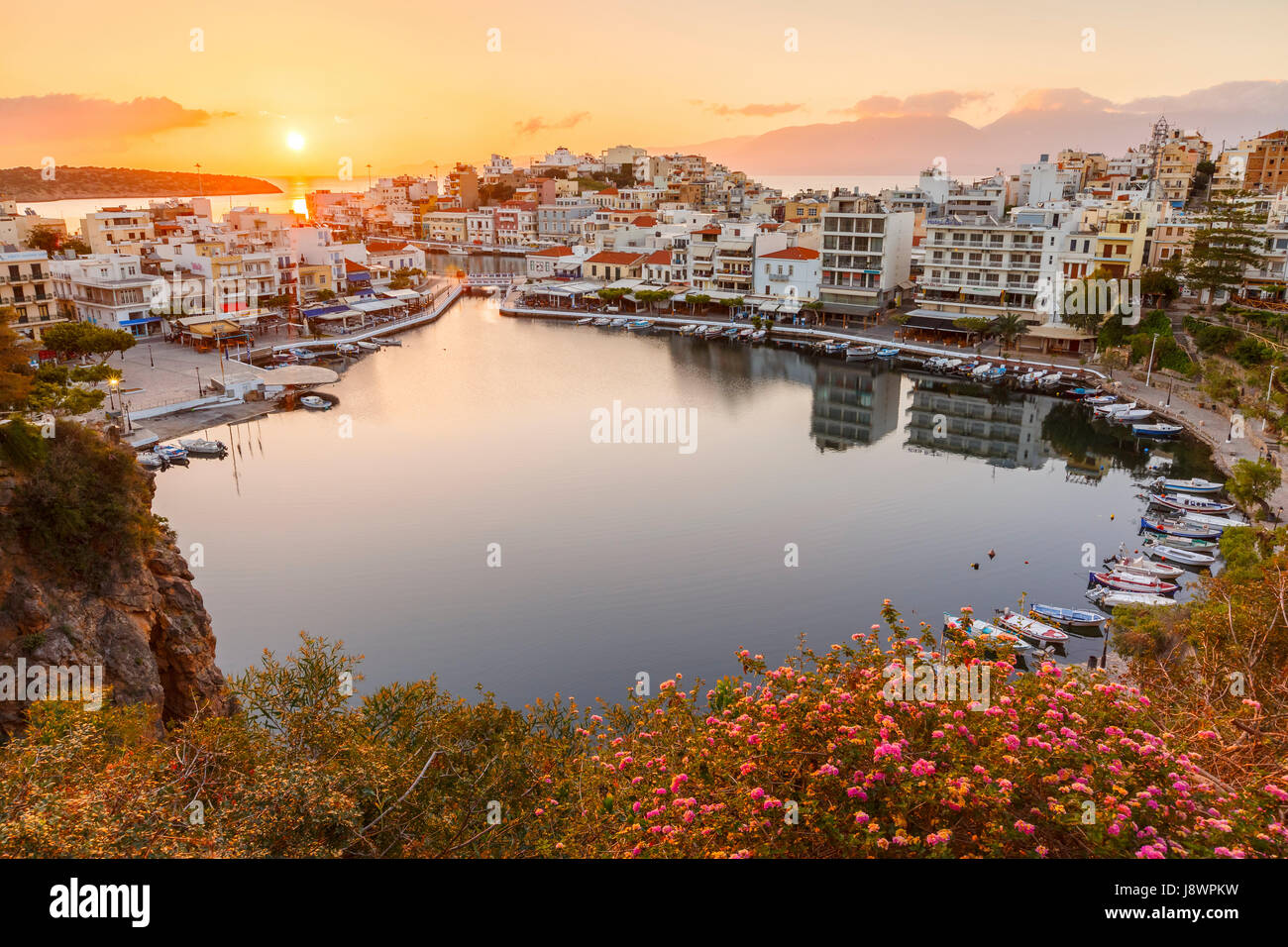 Morning view of Agios Nikolaos and its harbor, Crete, Greece Stock ...