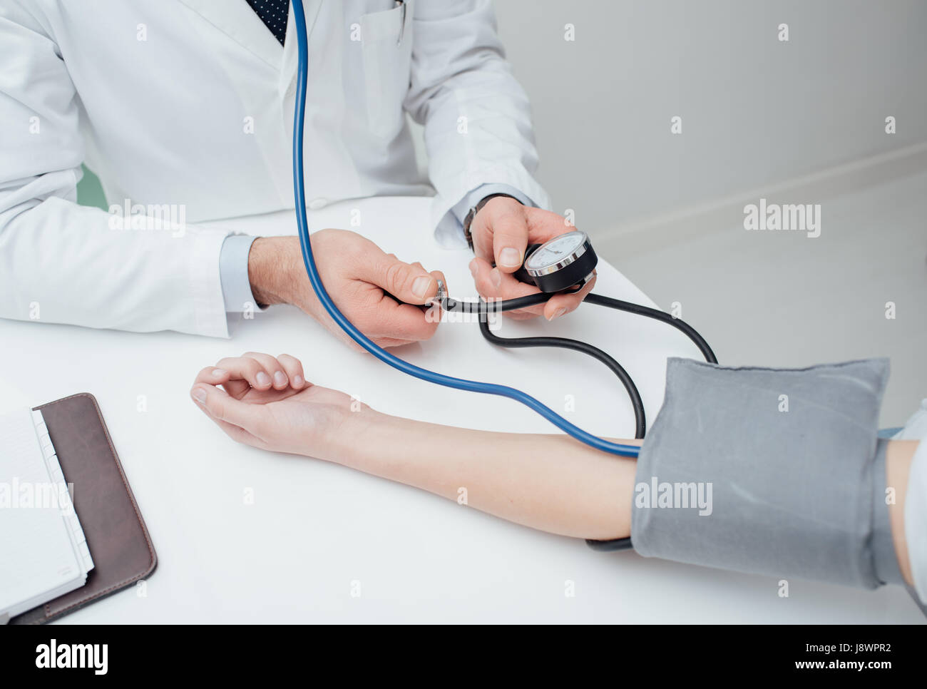 Pulses checking hi-res stock photography and images - Alamy