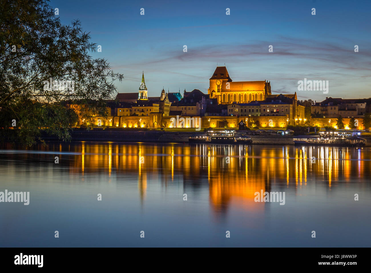 Panorama view of medieval city of Torun, Poland. Old town reflects in ...