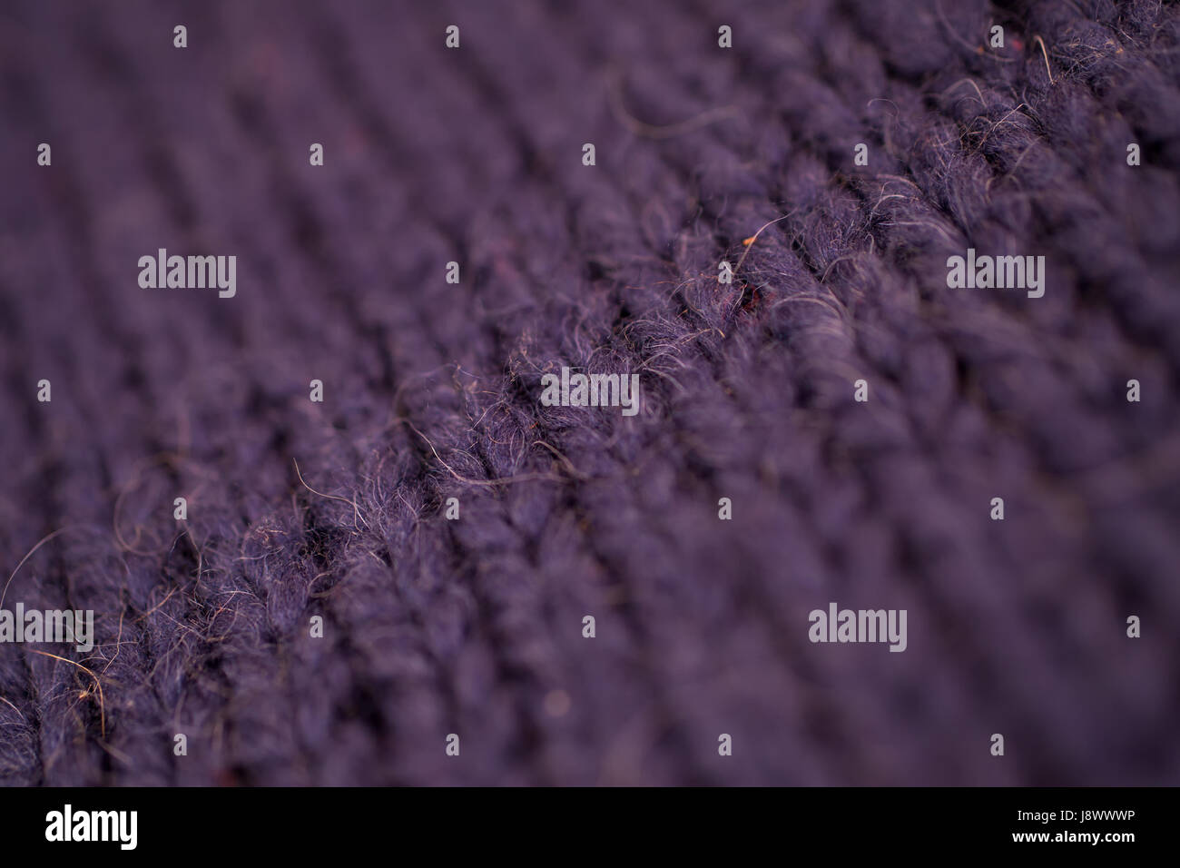 Texture of dark blue knitted woolen fabric closeup Stock Photo - Alamy