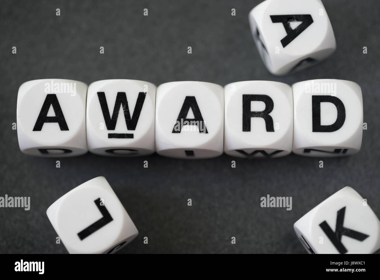 word award on white toy cubes Stock Photo - Alamy