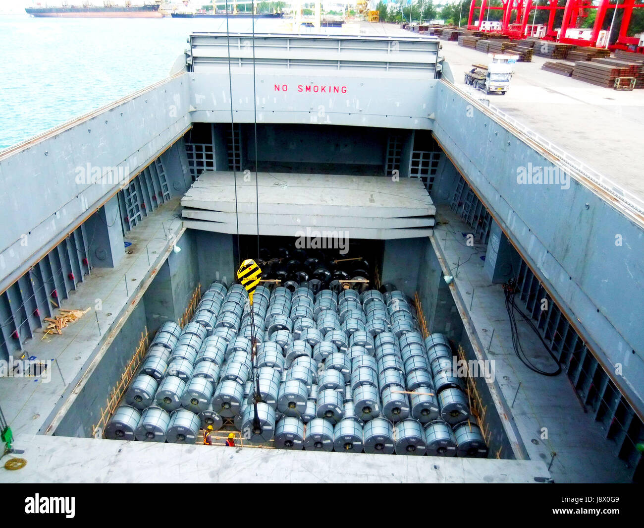 Stowage steel coil in hold of vessel Stock Photo - Alamy
