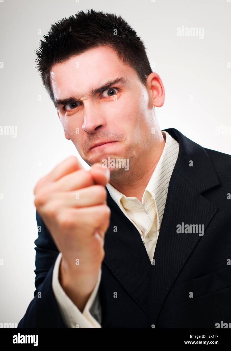 Angry mean looking man hi-res stock photography and images - Alamy