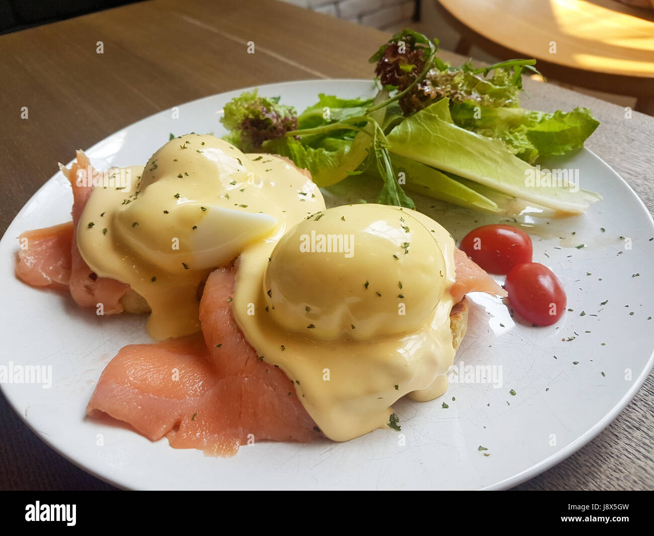 Smoked Salmon Eggs Benedict with Hollandaise Sauce Stock Photo - Alamy