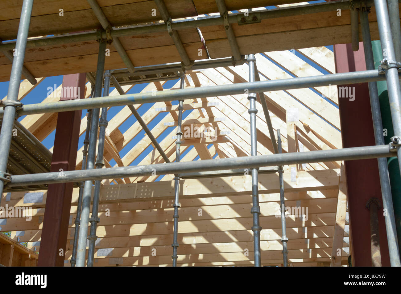 Property being built with steel and wooden frame Stock Photo - Alamy
