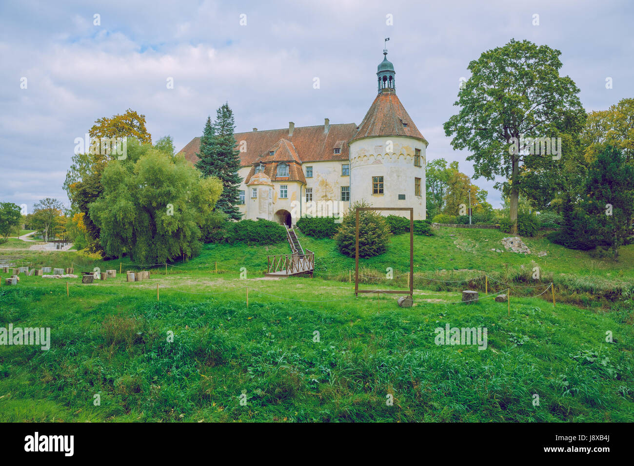 Medieval old castle in Bauska, Latvia. 2015 Summer, green grass and ...
