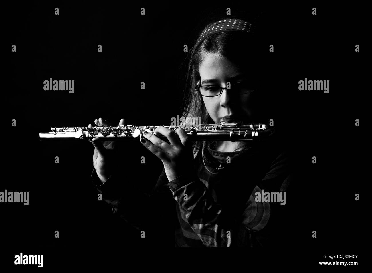 Man playing the transverse flute hi-res stock photography and images ...