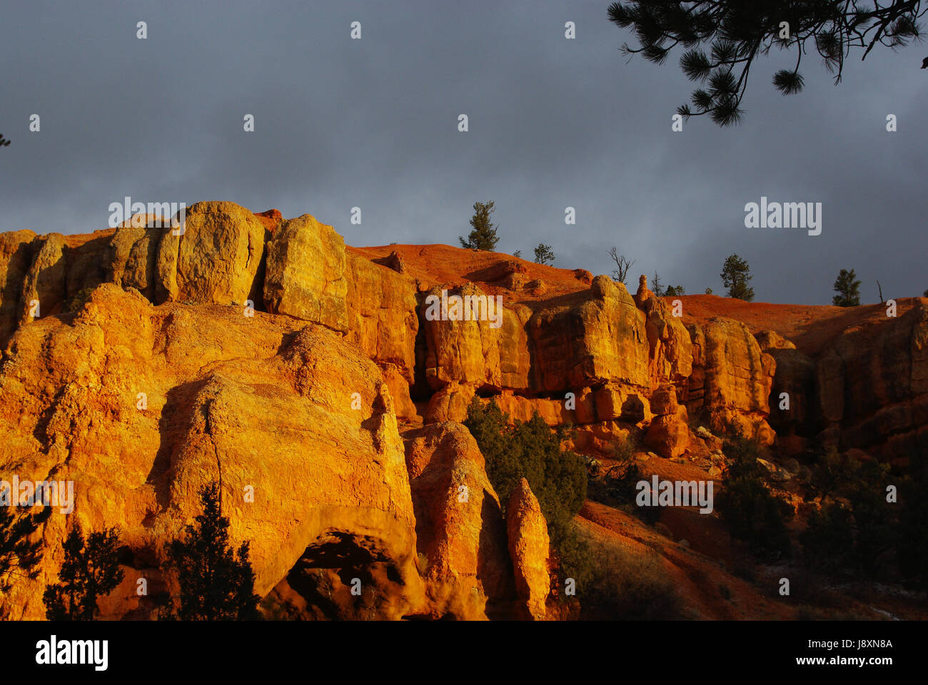 red canyon rock walls and towers in the morning sun,utah Stock Photo ...