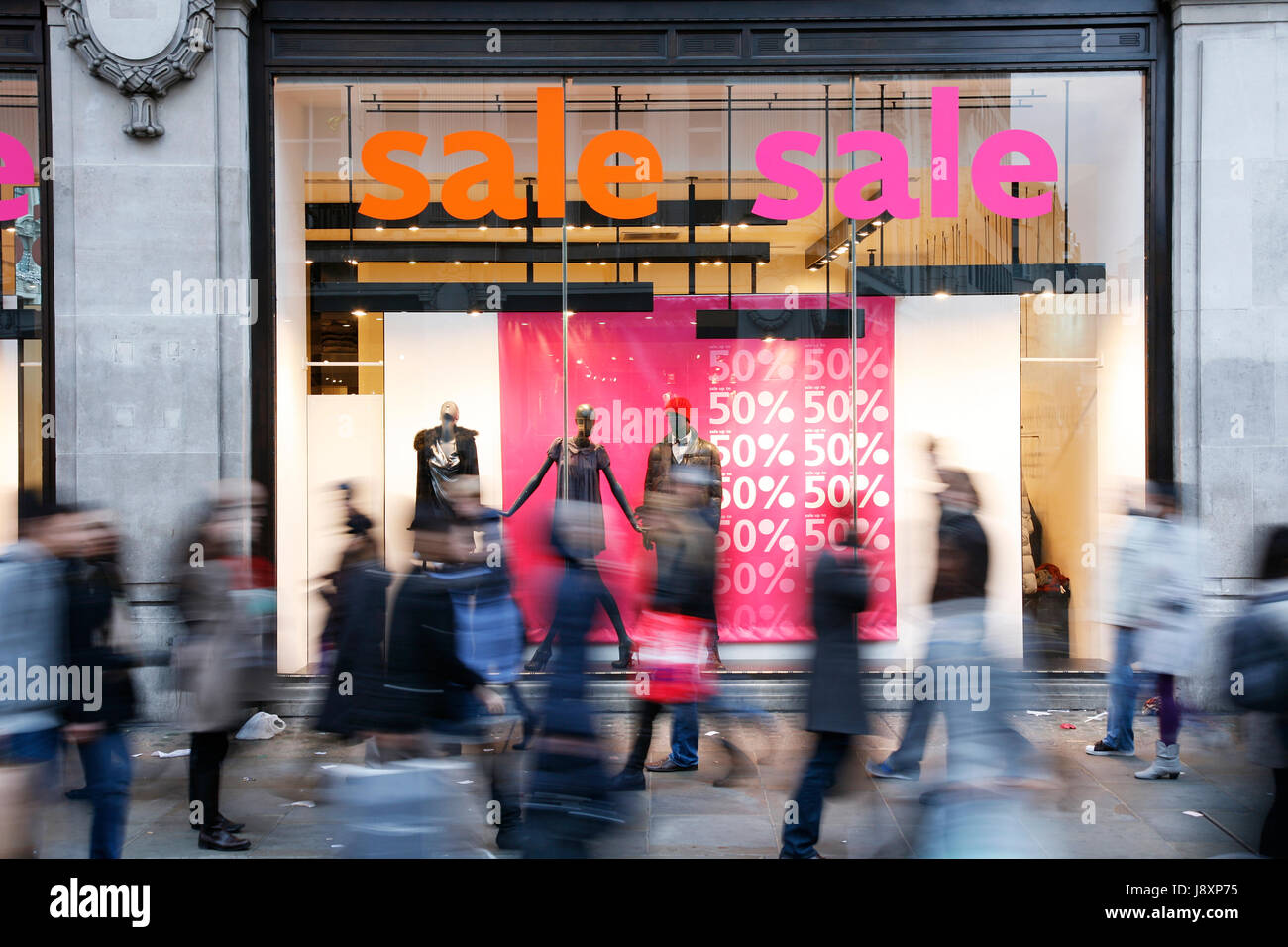 Sale signs in shop window, big reductions Stock Photo - Alamy