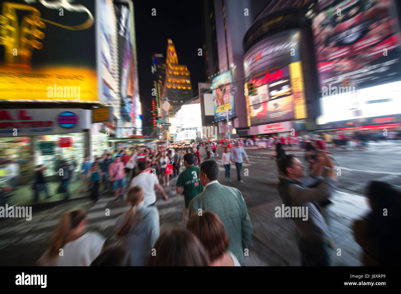 Pedestrians crossing a street at Times Square in New York Stock Photo ...