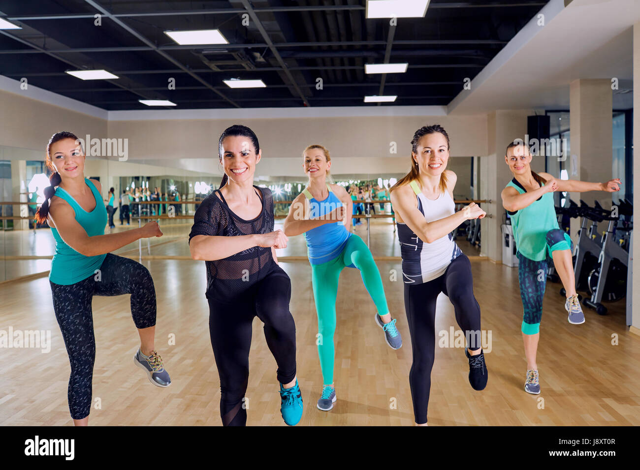 Group training of girls in the gym Stock Photo - Alamy