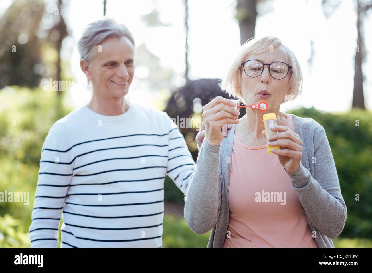 Stylish pensioners having fun in the park Stock Photo - Alamy