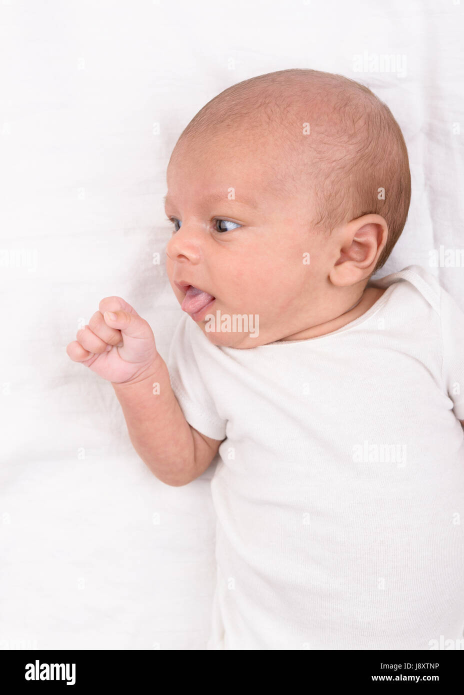 Mixed race south asian and caucasian newborn baby on white sheet Stock ...