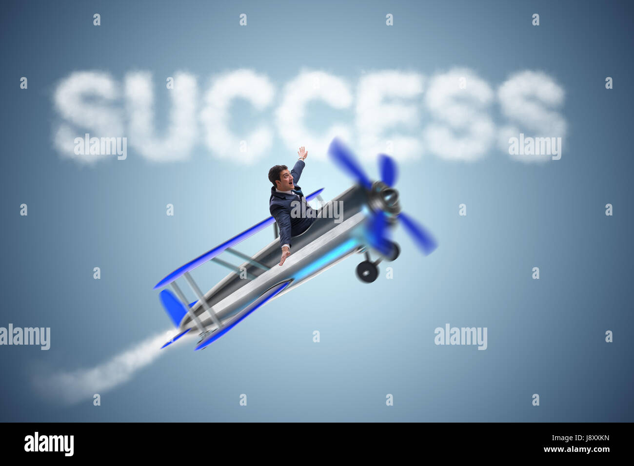 Businessman flying on airplane in success concept Stock Photo - Alamy