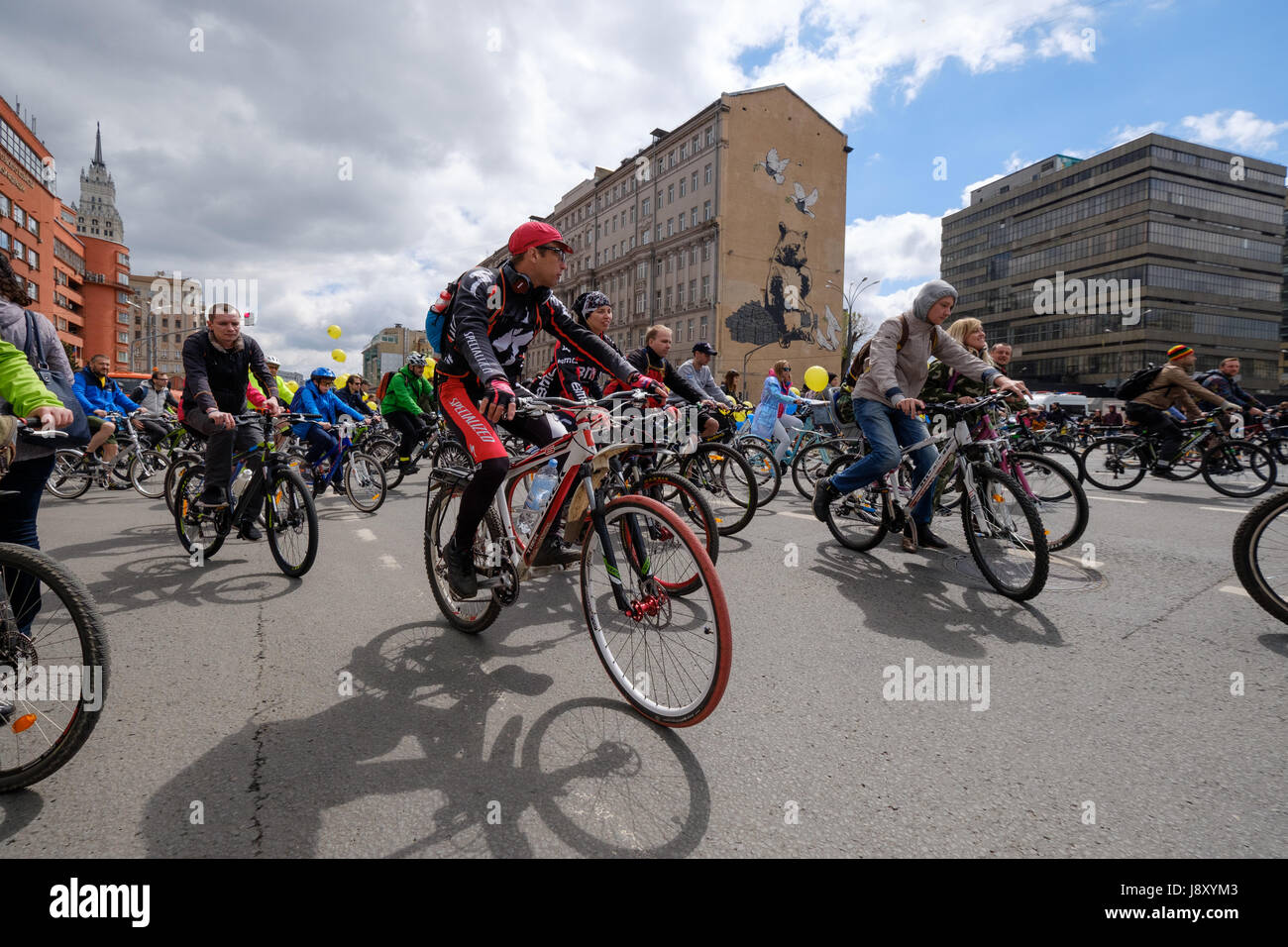 Many cyclists participate in bicycle parade around the city centre ...