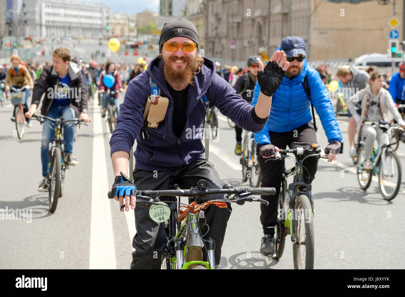 Many cyclists participate in bicycle parade around the city centre ...