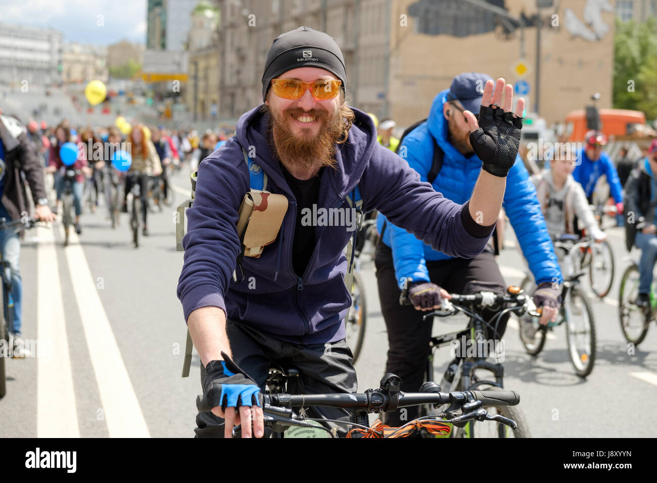 Many cyclists participate in bicycle parade around the city centre ...