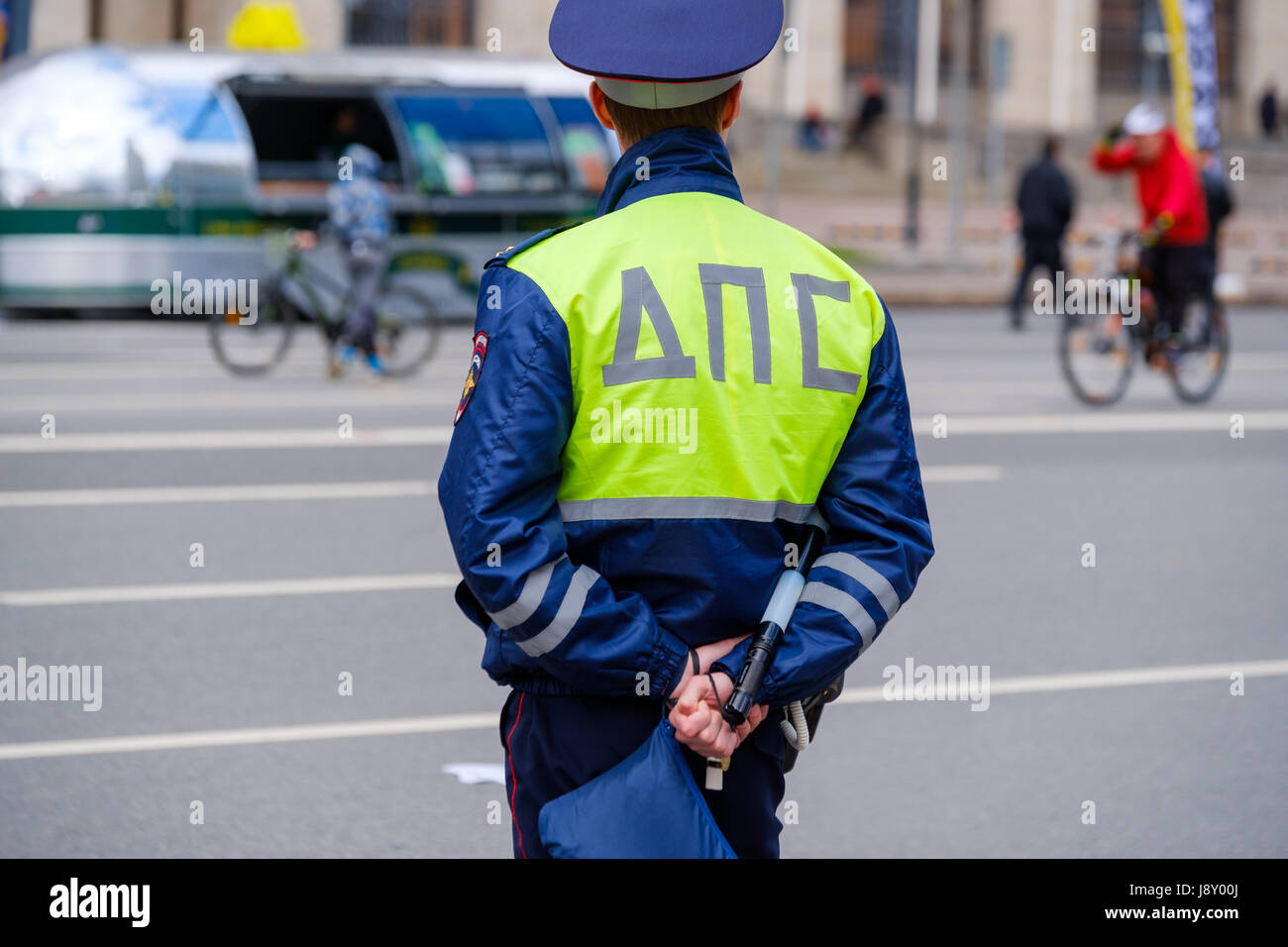Traffic policeman works on a street at day time Stock Photo - Alamy
